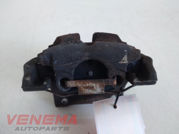 Rear brake calliper, left BMW 1 serie 118d 16V - 34216768696 N47 ATE