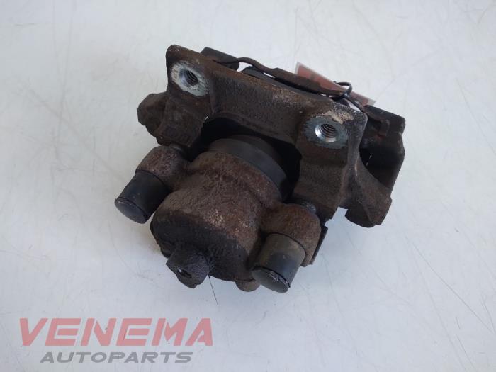 Rear brake calliper, left BMW 1 serie 118d 16V - 34216768696 N47 ATE
