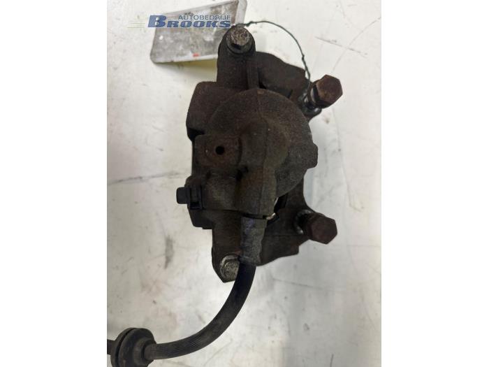 Front brake calliper, left Opel Adam 1.4 16V - 93191695 B14XER BOSCH